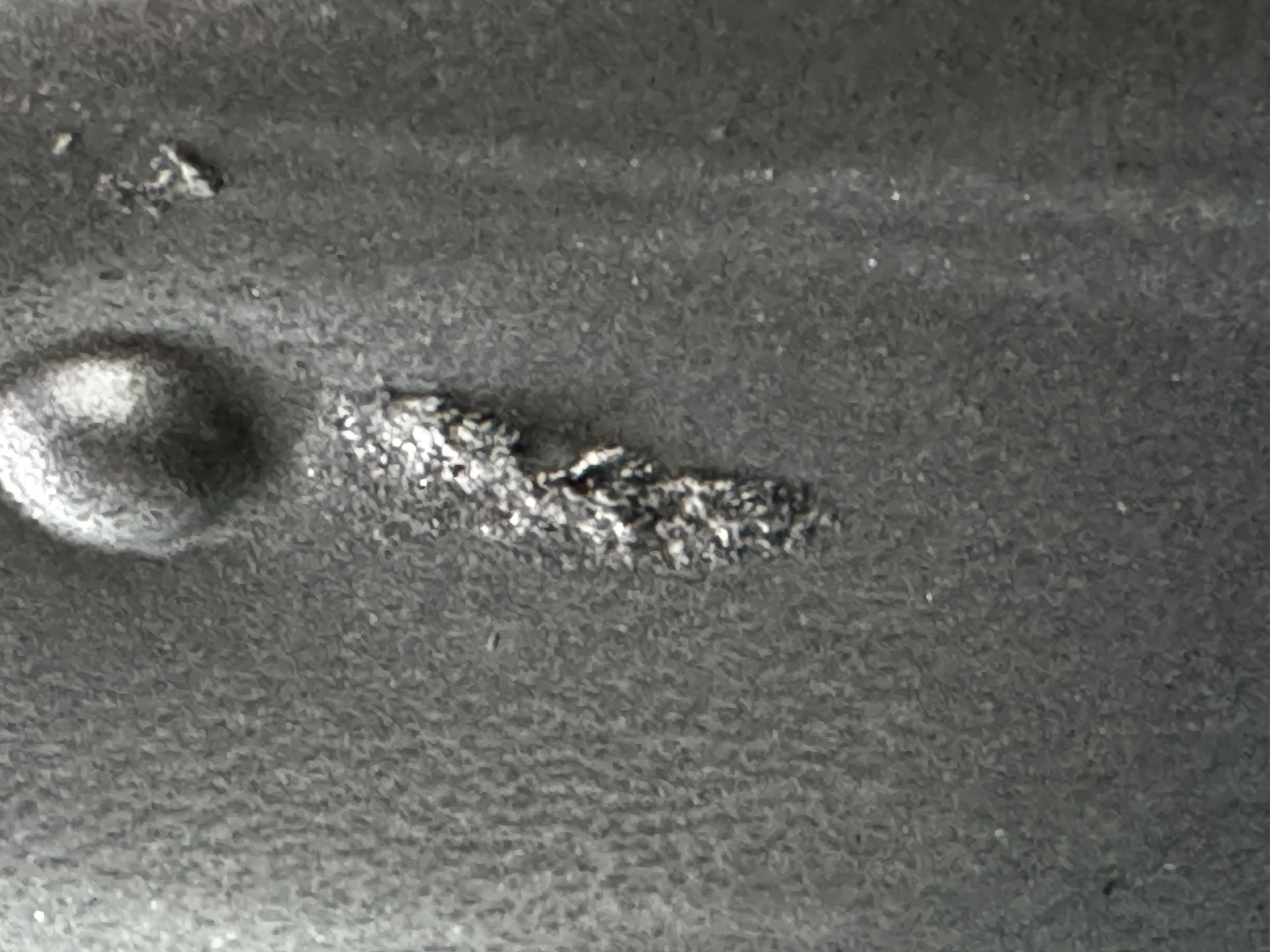 Corrosion or paint defect?